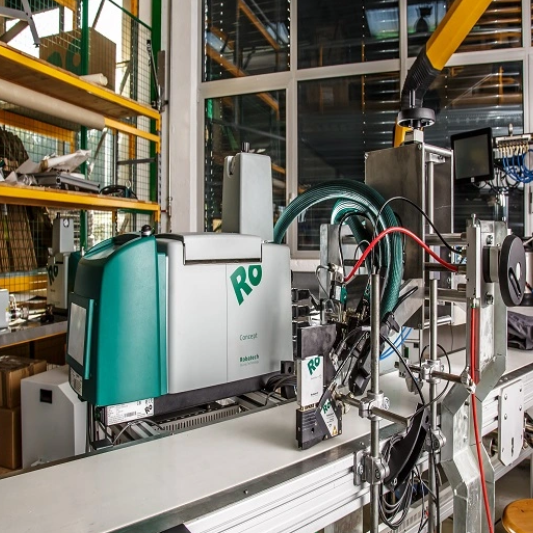 ROBATECH - Système d'application automatisée de colle