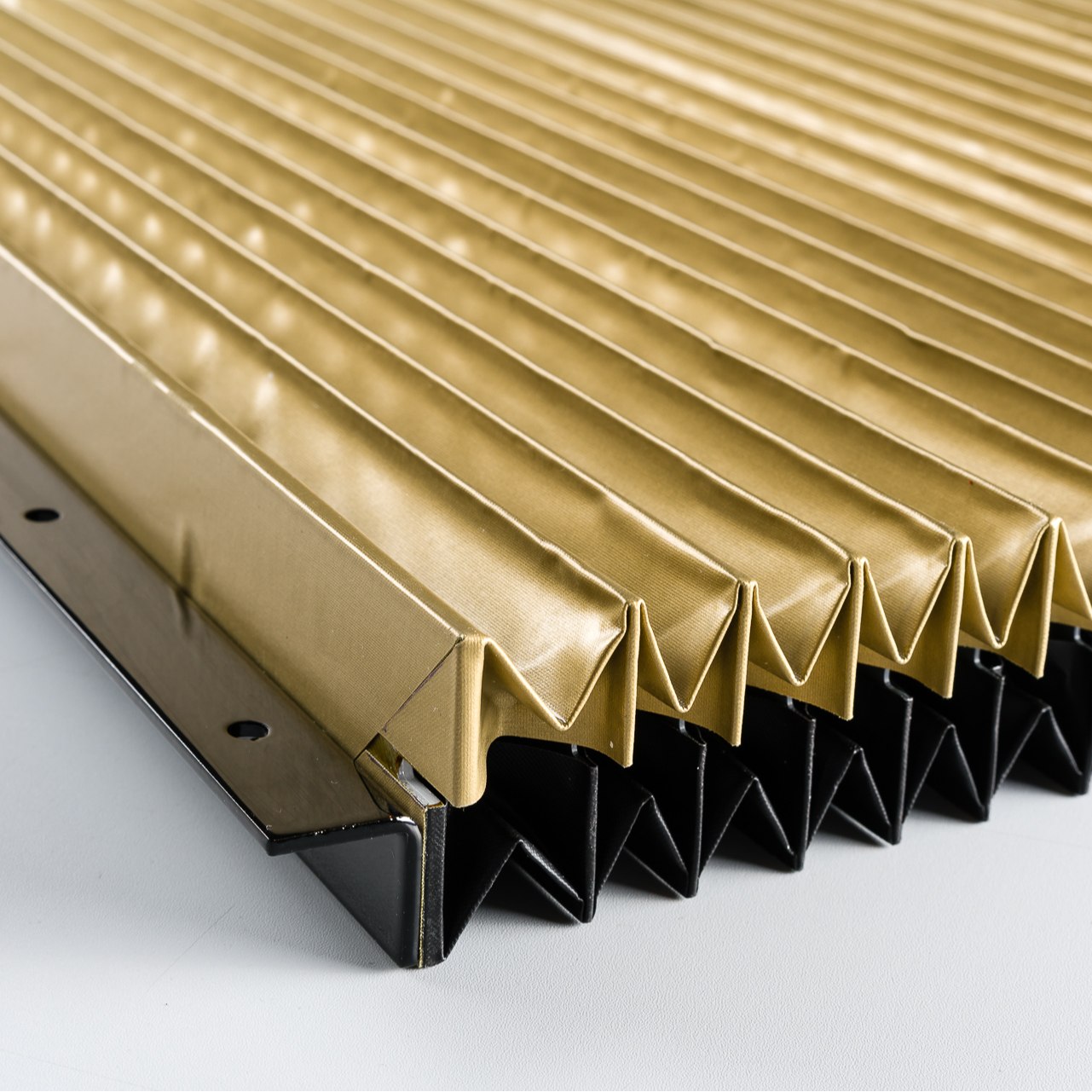 Pleated protective bellows